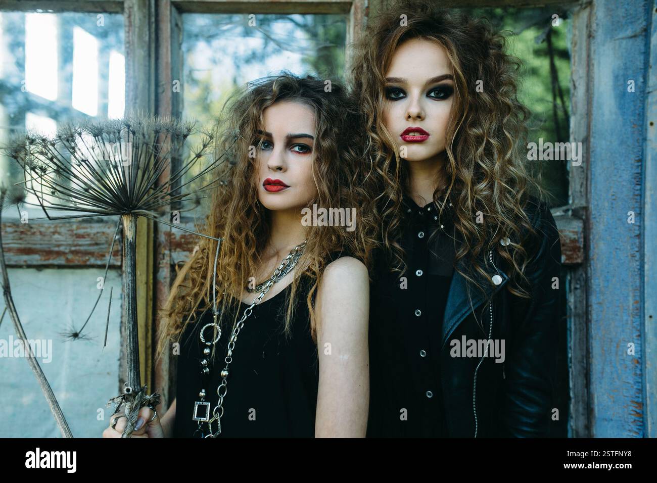 Two vintage women as witches Stock Photo - Alamy