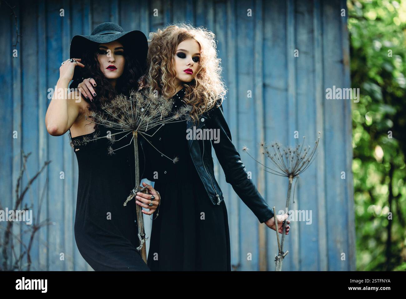 Two vintage women as witches Stock Photo - Alamy