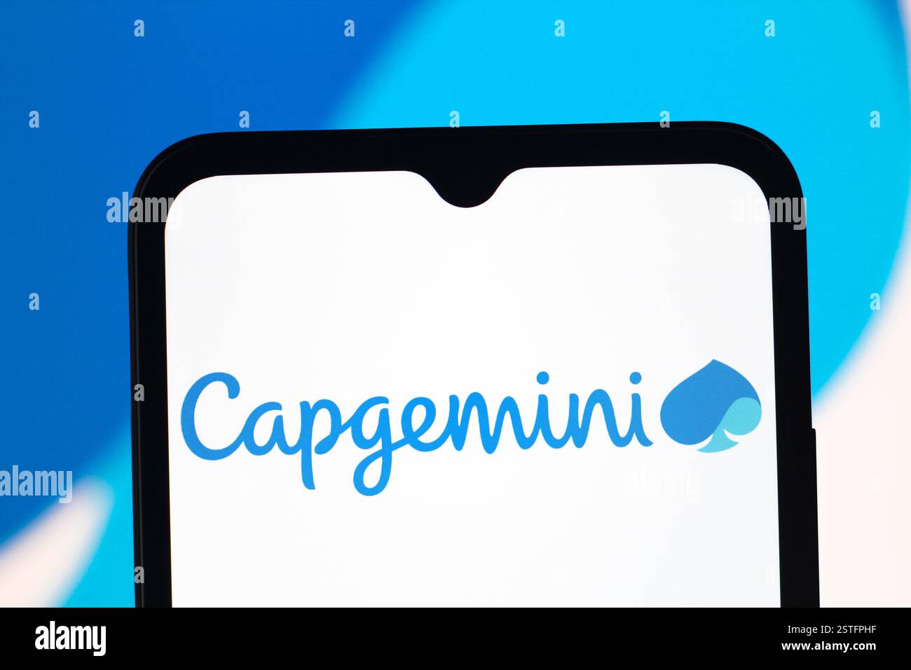 In this photo illustration, the Capgemini logo is seen displayed on a ...
