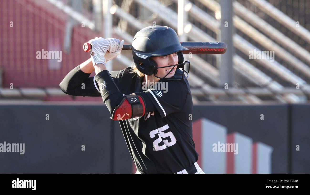UNLV catcher Jesse Farrell (25) bats during an NCAA softball game ...