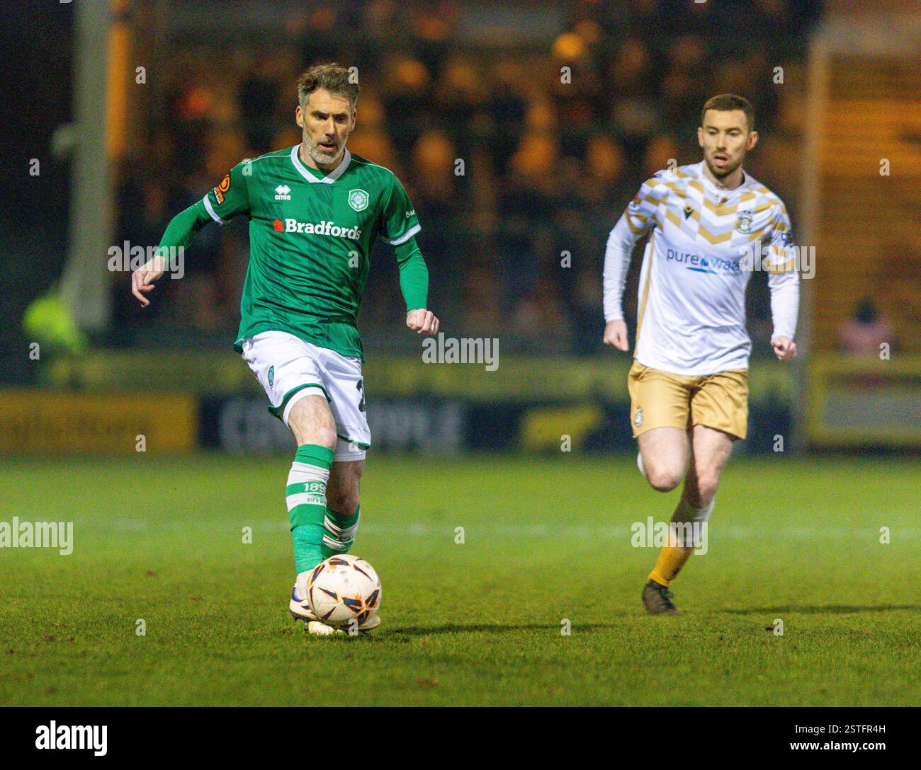 Michael Smith of Yeovil Town and Haydn Hollis of Tamworth during the ...
