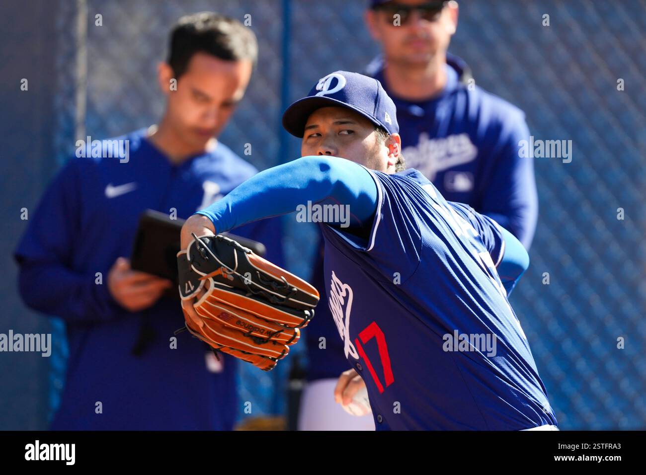 Los Angeles Dodgers two-way player Shohei Ohtani (17) throws in the ...