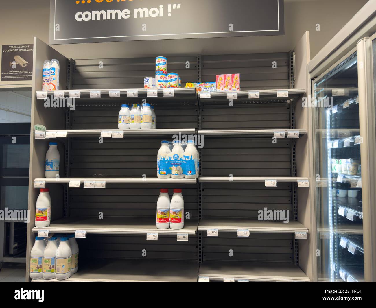 Empty milk shelves hi-res stock photography and images - Alamy