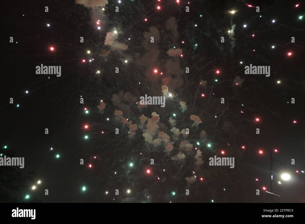 Sparkling fireworks illuminating darkness hi-res stock photography and ...