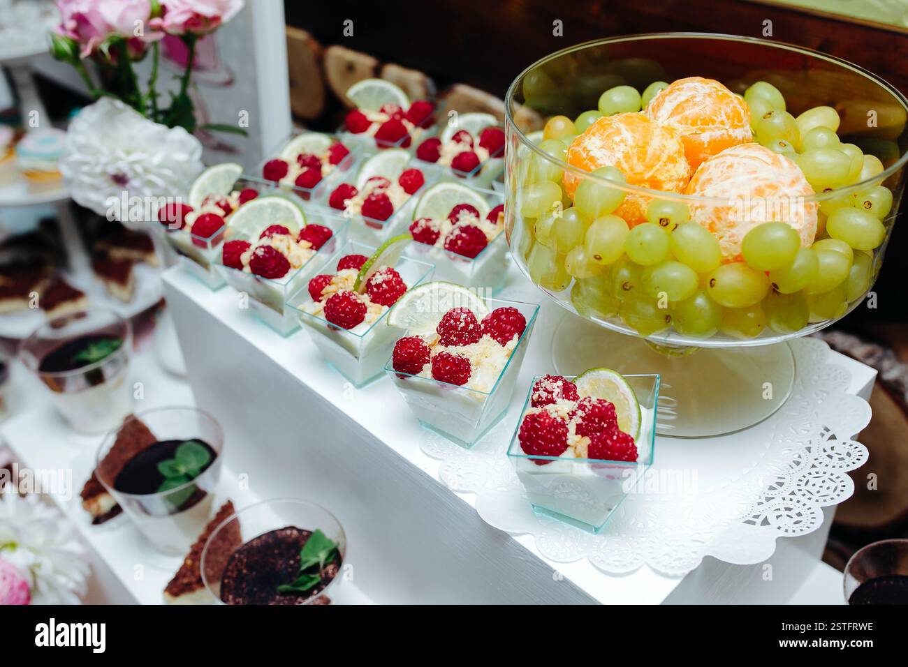 Delicious fancy wedding cake and fruit Stock Photo - Alamy