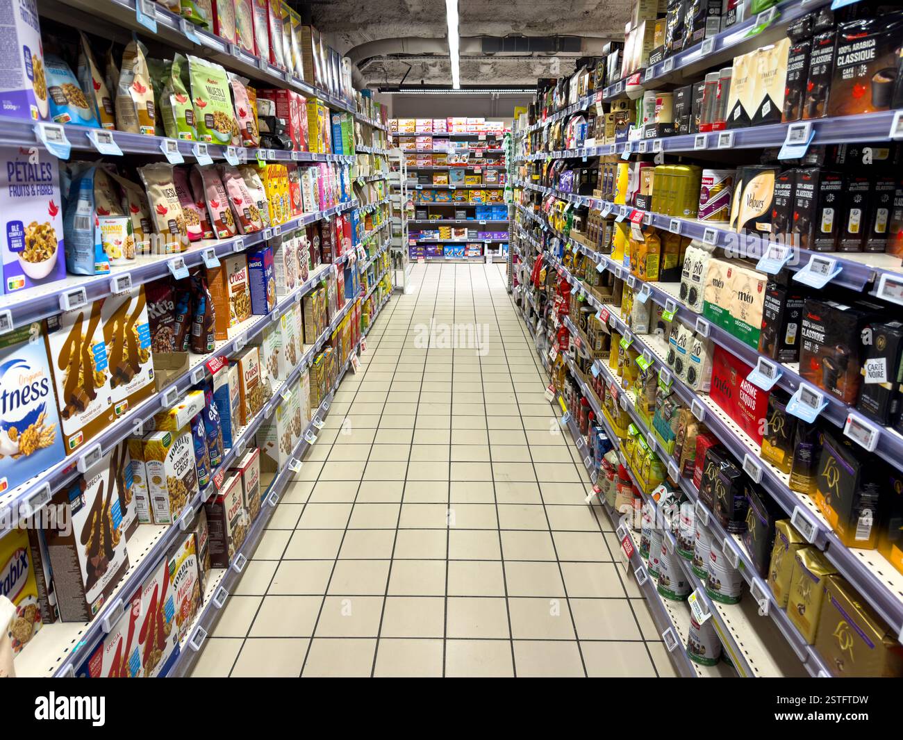 Grocery aisle filled with colorful cereal boxes and snack options Stock ...