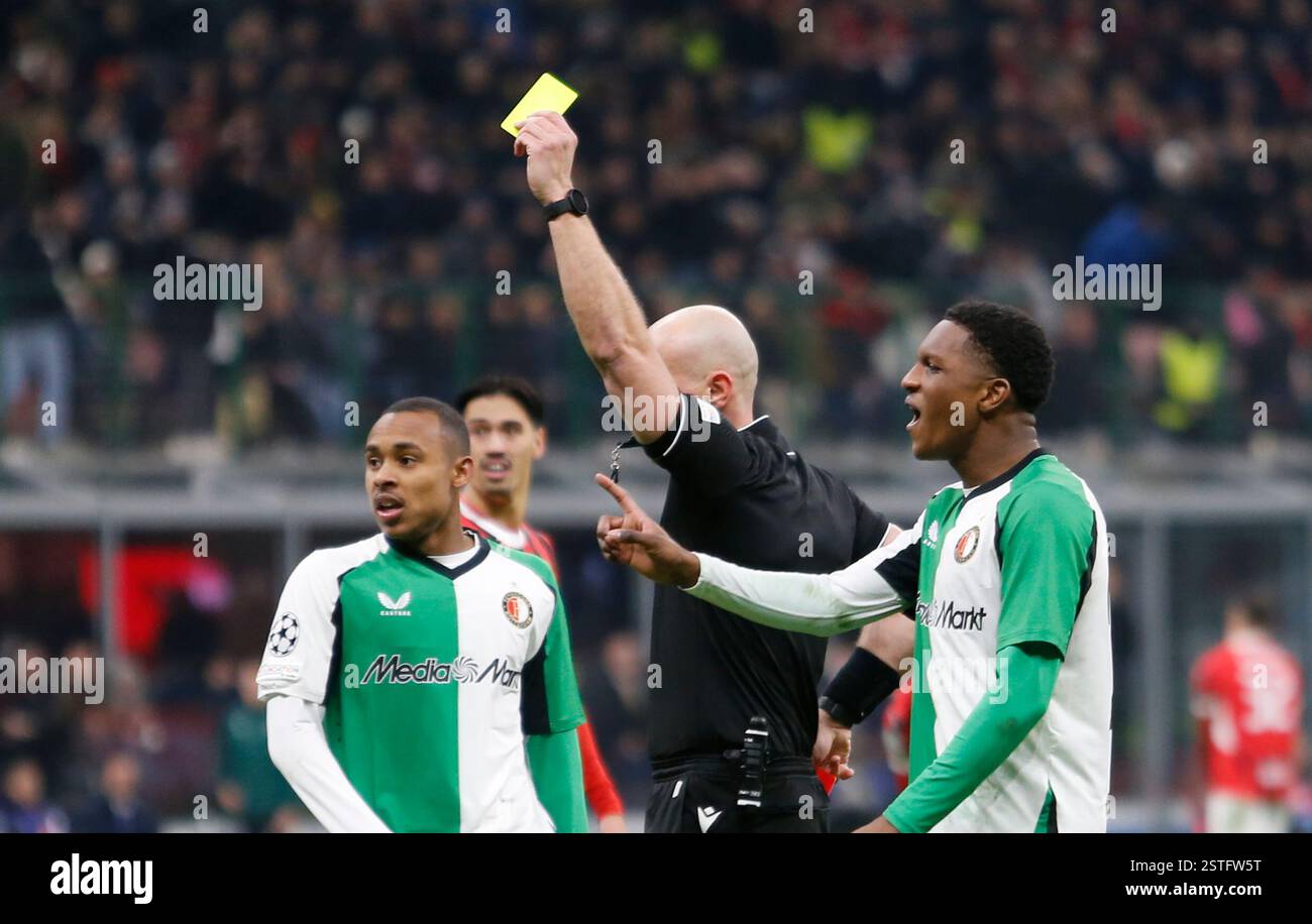 Milan, Italy. 18th Feb, 2025. Refree showing the second yellow card to ...