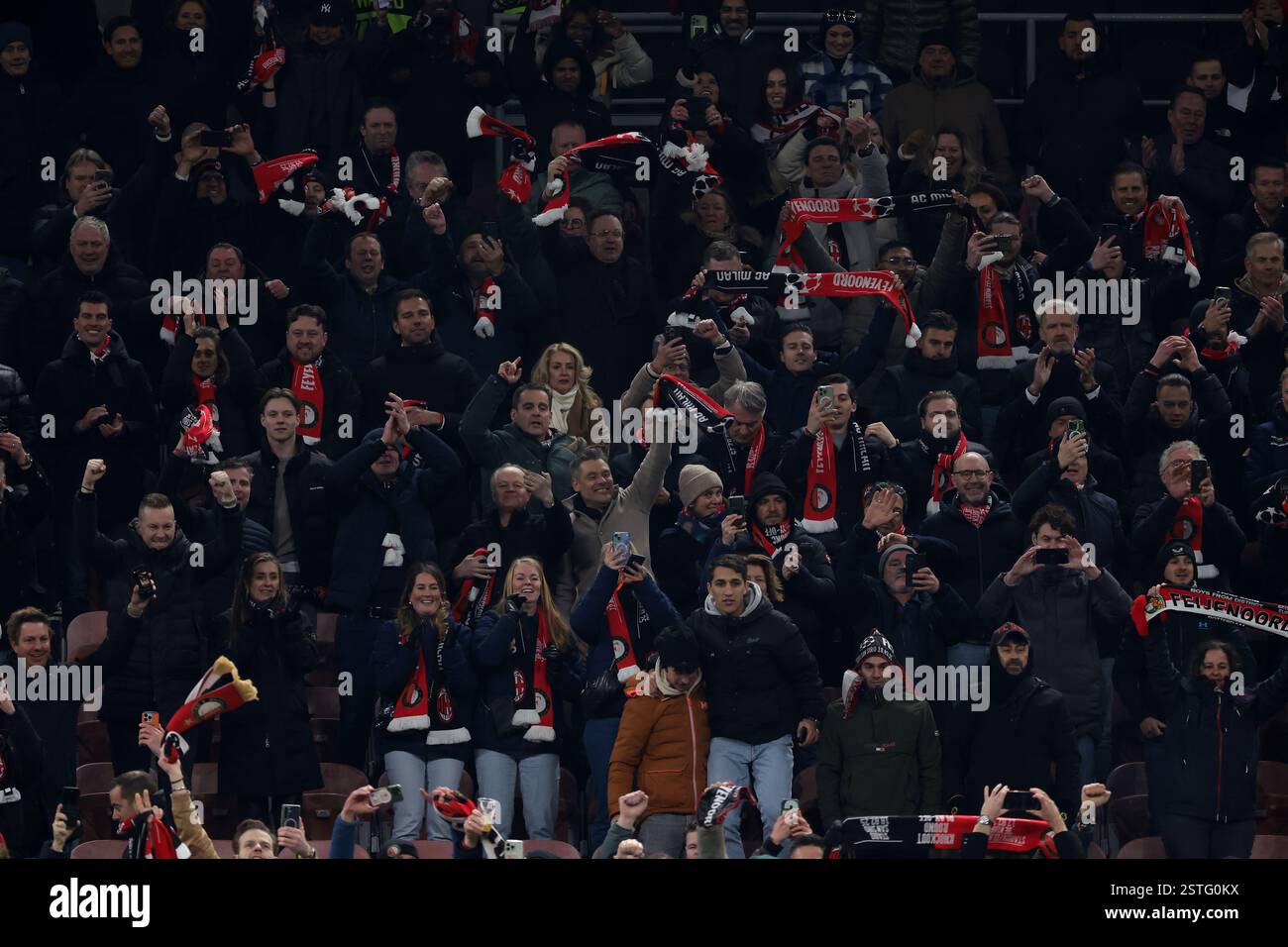 Milan, Italy. 18th Feb, 2025. Feyenoord fans celebrate the 2-1 ...