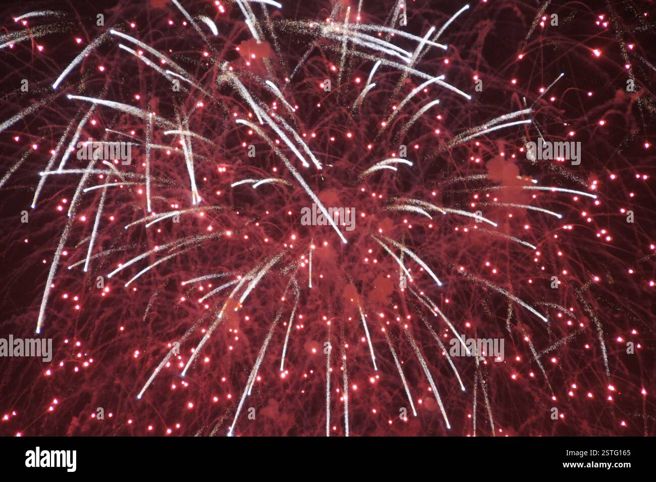 Boston fireworks illuminate the night sky, a vibrant display of red and ...
