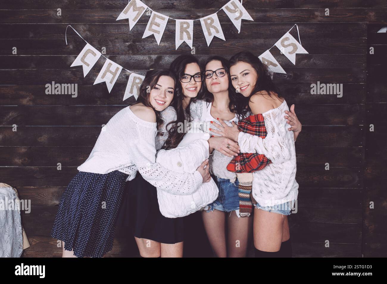 Cute girl hug and pose for the camera Stock Photo - Alamy
