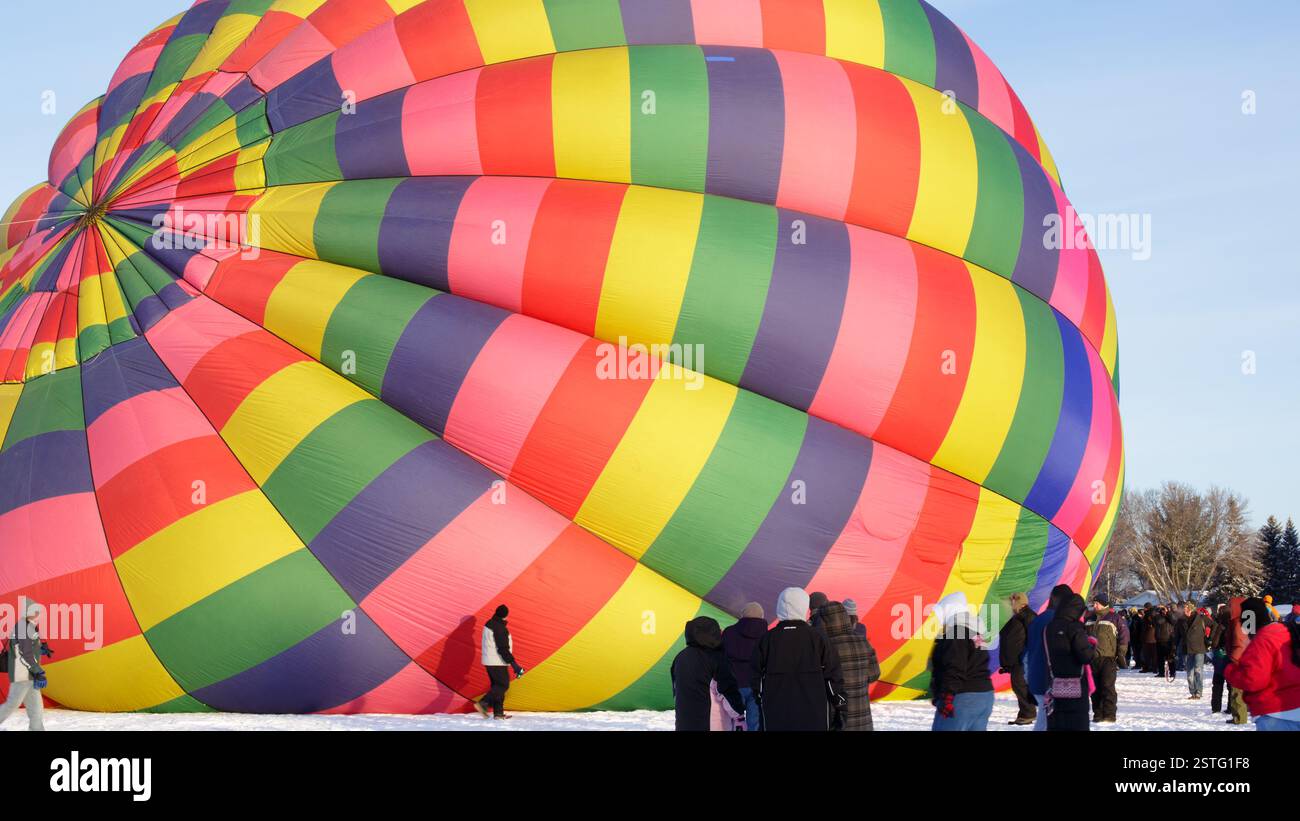 Hot air balloon being inflated at a winter festival in Hudson ...