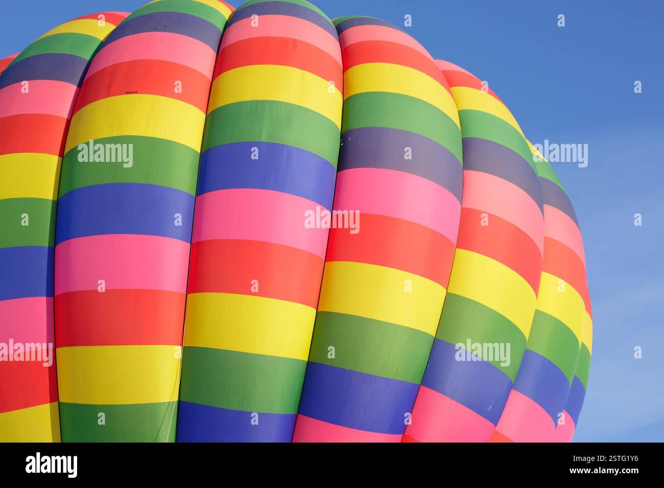 Colorful inflated hot air balloon Stock Photo - Alamy