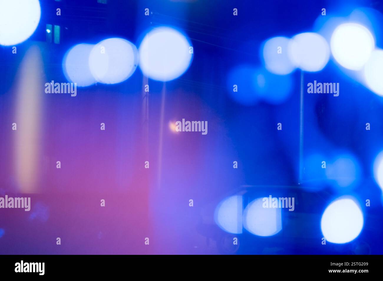 Blurred room with spot of light in blue color Stock Photo - Alamy