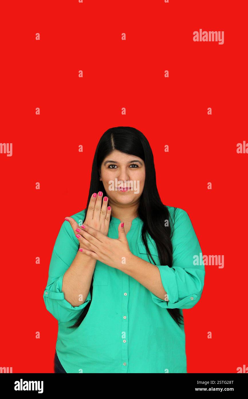 Latina adult woman uses Mexican Sign Language as a person with a ...