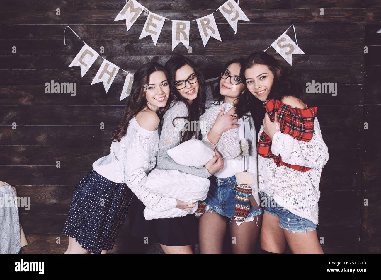 Cute girl hug and pose for the camera Stock Photo - Alamy