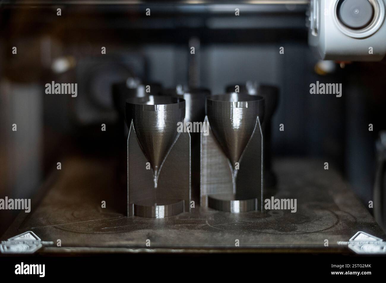 A 3D printer makes rocket wings intended for drone equipment in a ...