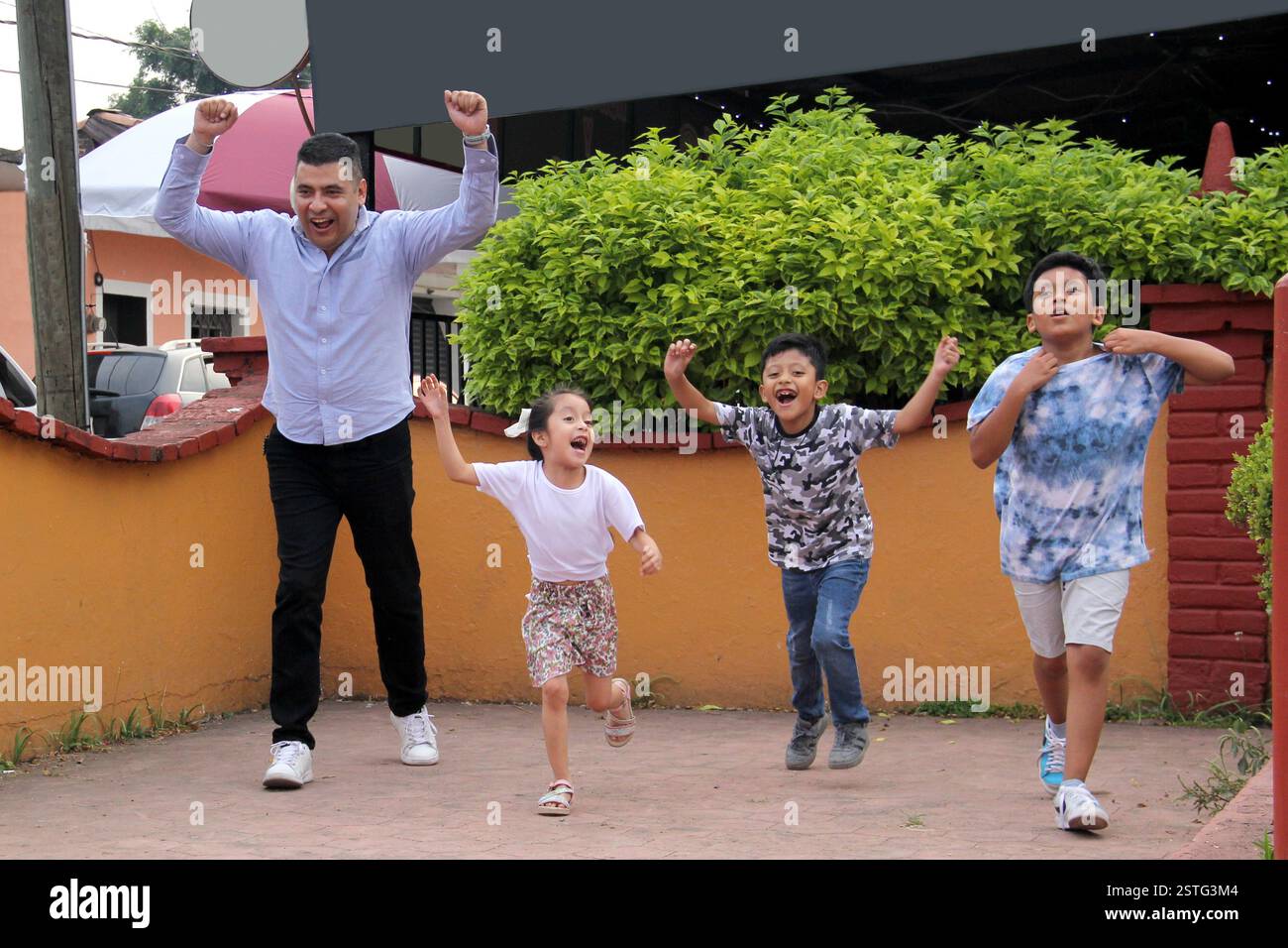 Divorced single dad plays with his two dark-skinned Latino sons and ...