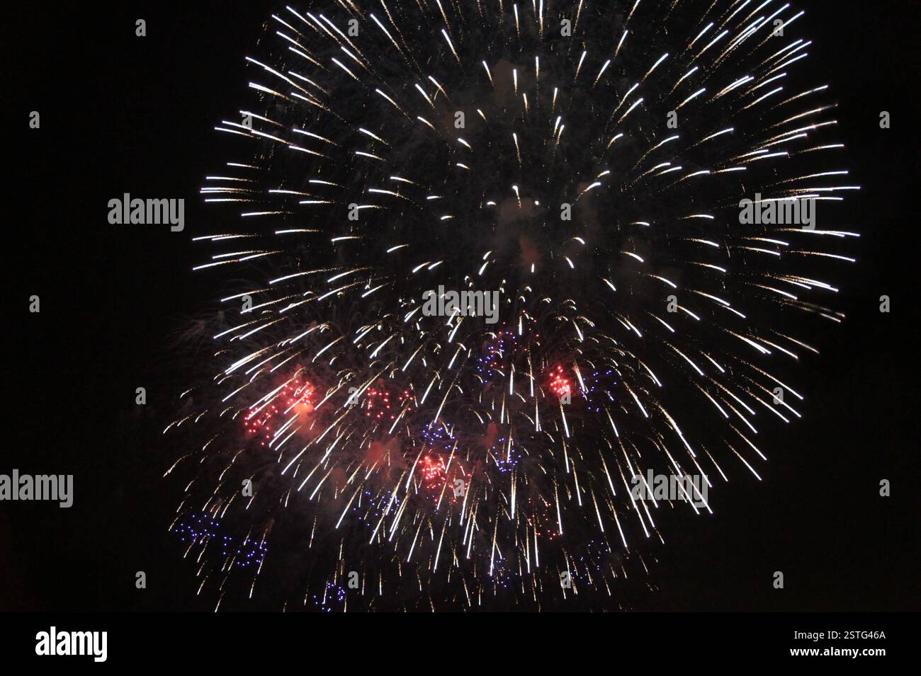 Boston: Fireworks bursting in the night sky, illuminating the darkness ...