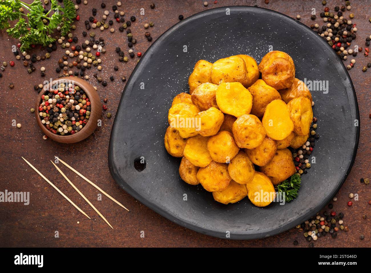 Crispy roasted yellow Potatoes - Creole potato Colombian food Stock ...