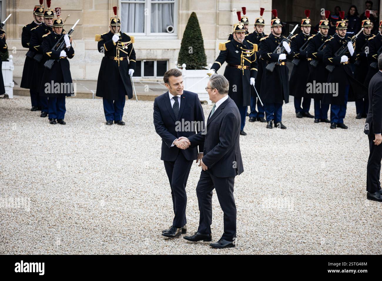 Paris, France. 17th Feb, 2025. French President Emmanuel Macron (L ...