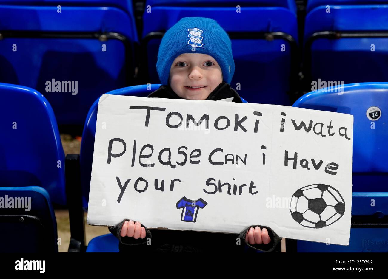 Young Birmingham City fan with a sign asking for Birmingham City's ...