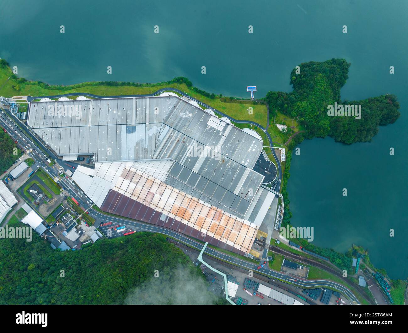(FILE) Aerial photo shows the Nongfu Spring plant on Qiandao Lake in ...
