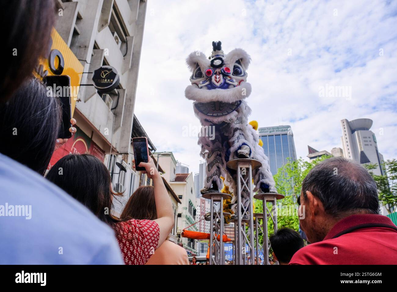 Kuala Lumpur, Malaysia. 16th Feb, 2025. People observe the acrobatic ...