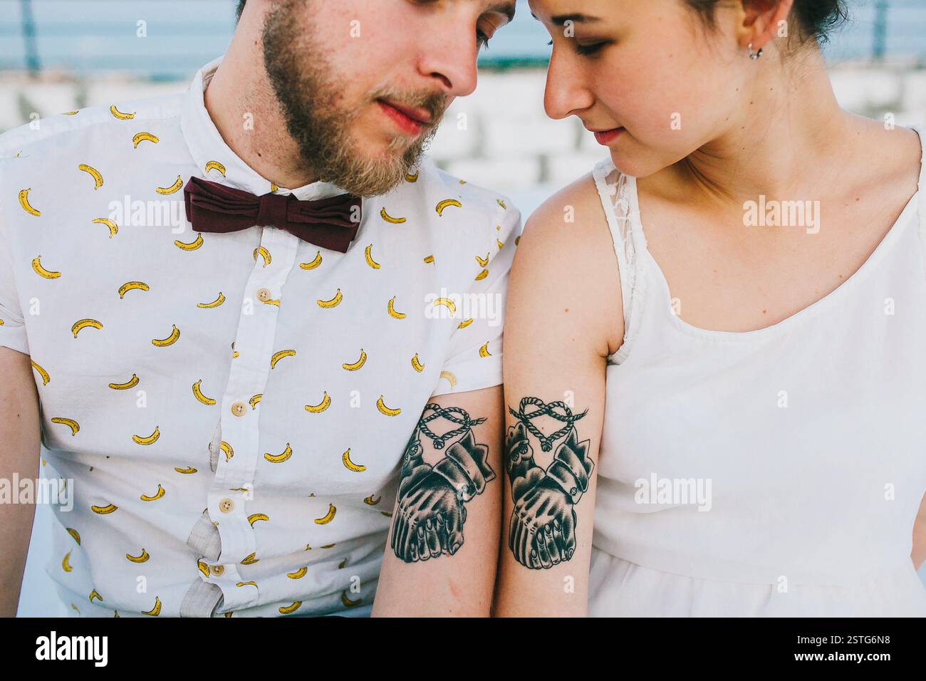 beautiful couple together on the roof of a tall building Stock Photo ...