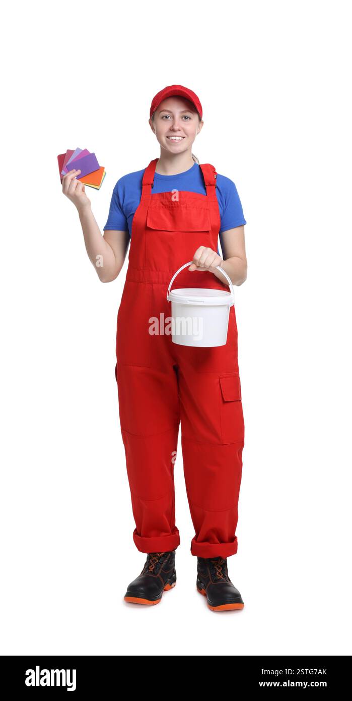 Professional painter with color samples and bucket of paint on white ...