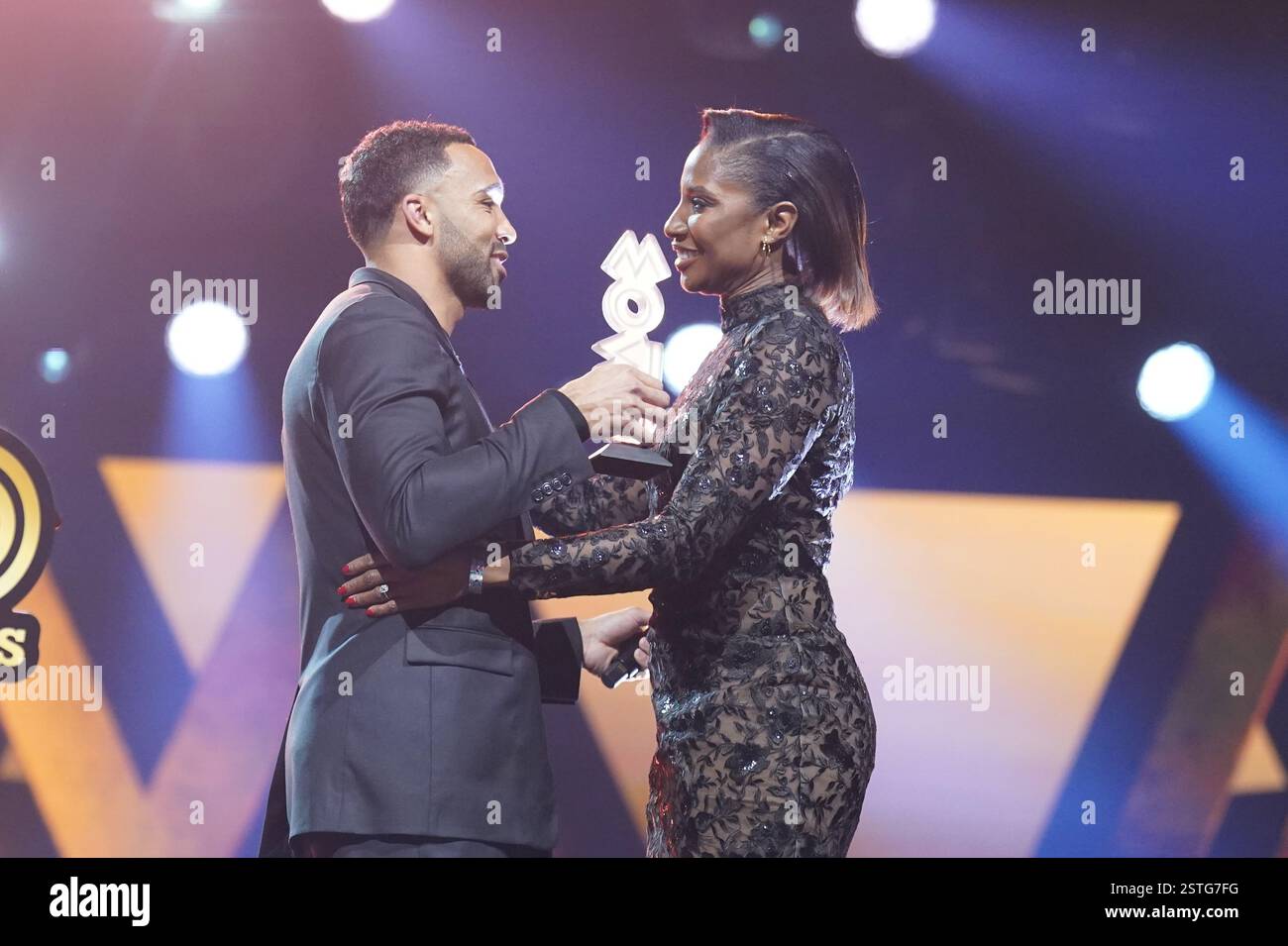 Olympic gold medallist Dame Denise Lewis, with Newcastle United player ...
