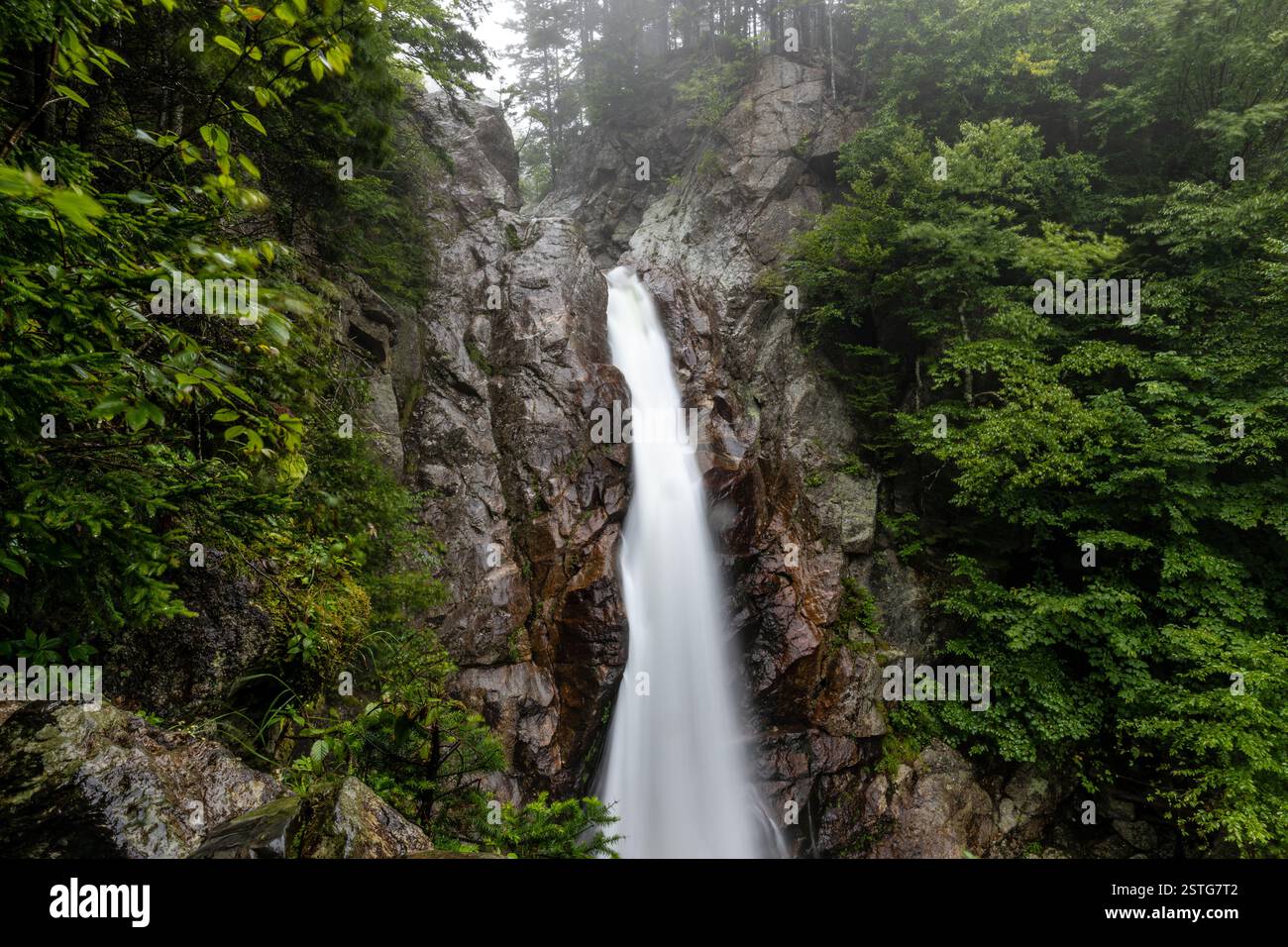 Waterfall taken with slow shutter speed to show motion with the water ...
