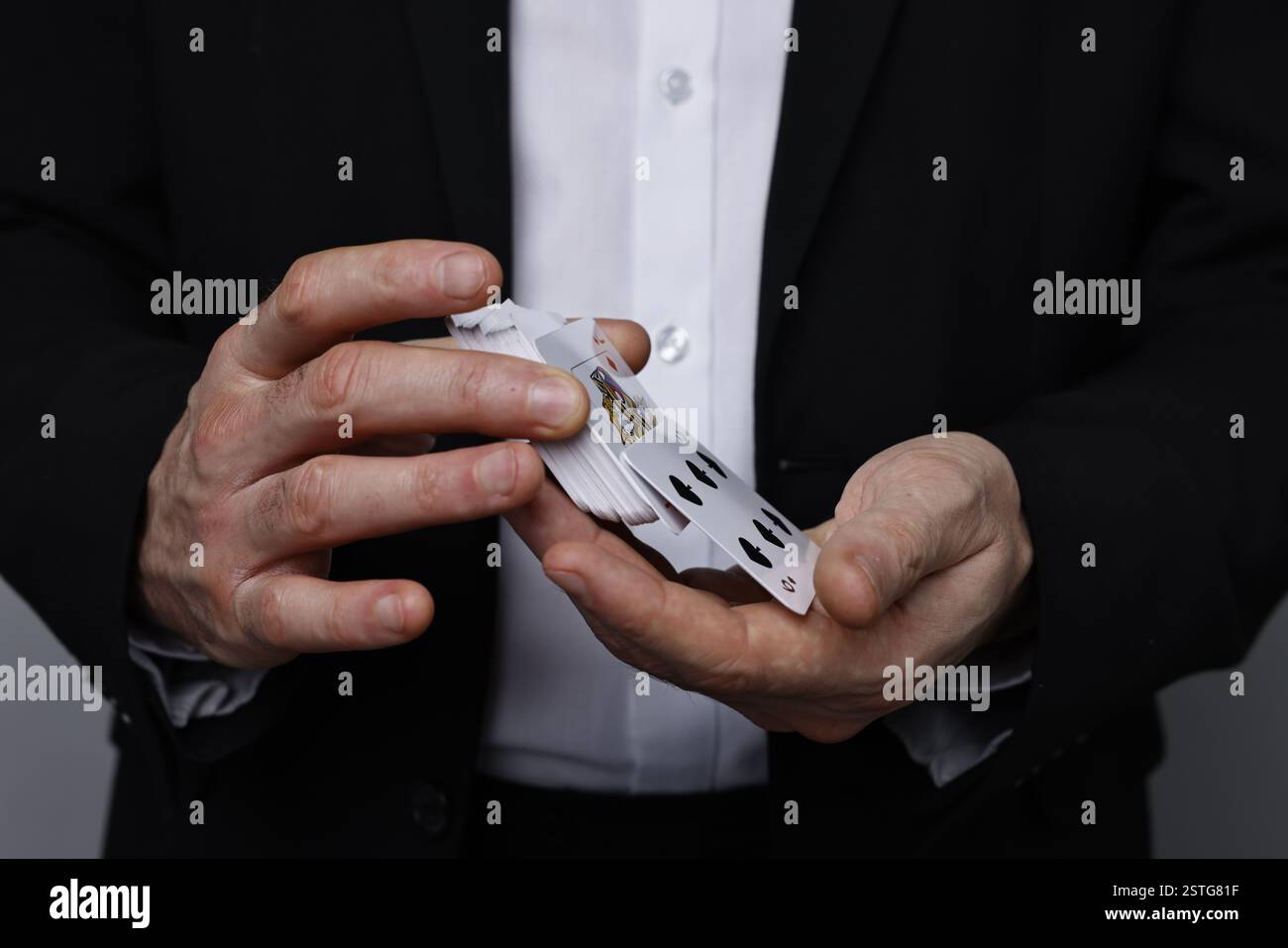 Hands shuffling deck cards on hi-res stock photography and images - Alamy