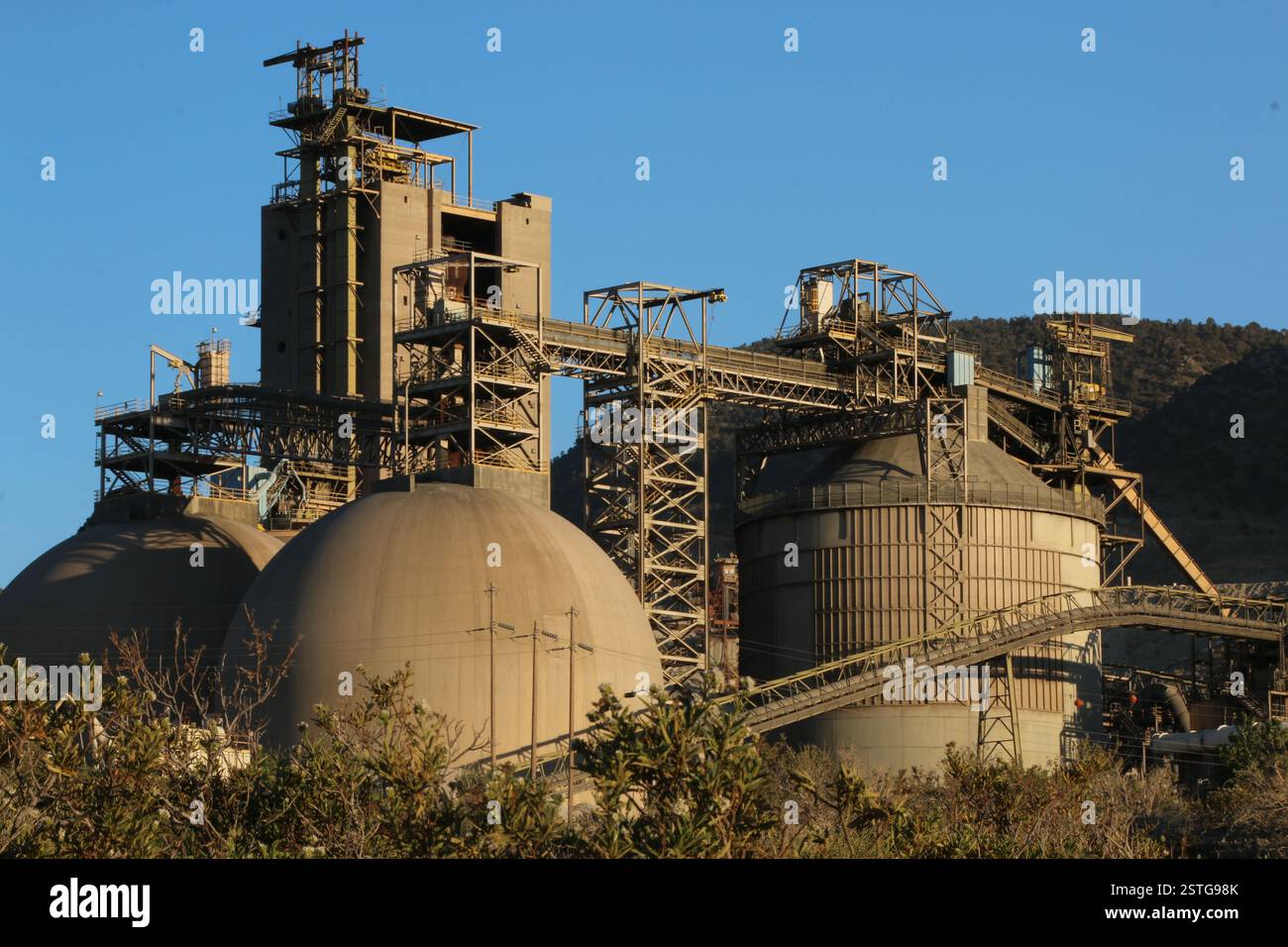 The architectural design of an industrial cement plant with round ...