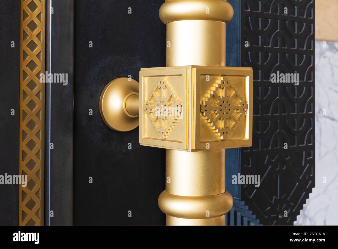 Gilded door handle of the main entrance door to the Qasr al Watan presidential palace in Abu ...