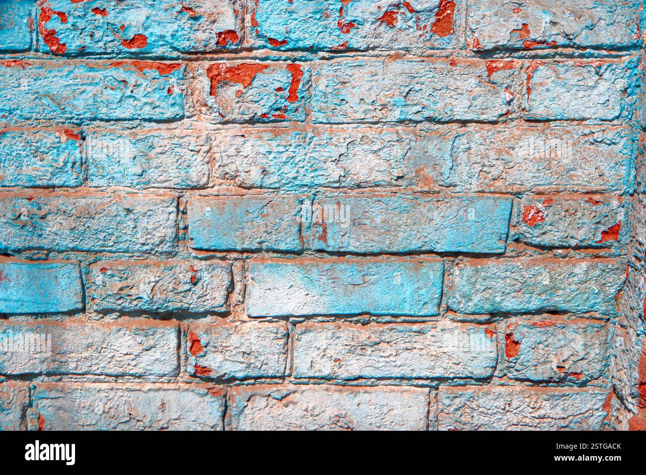 Cracked damaged brick wall painted in blue color texture Stock Photo ...