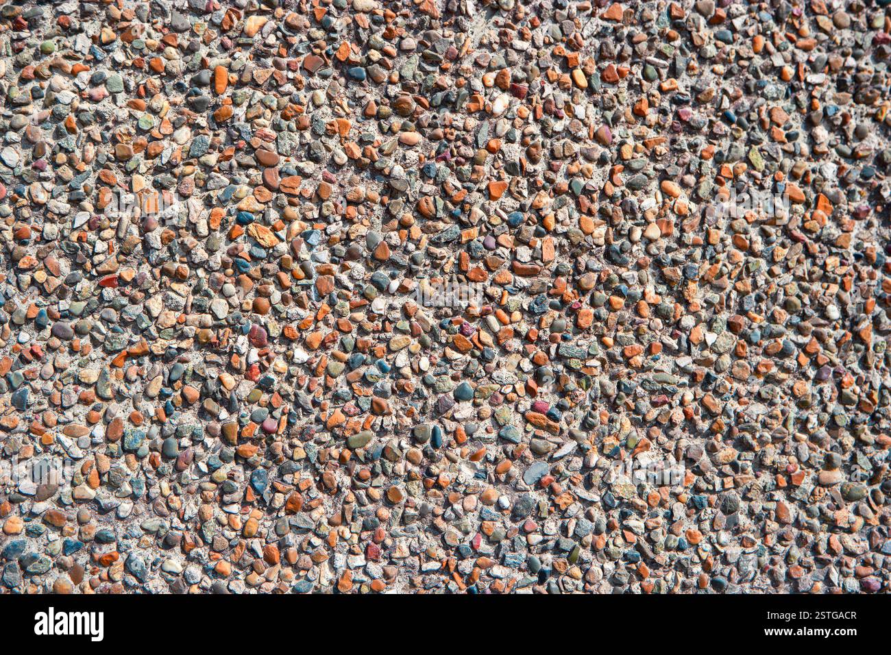 Crushed gravel in cement wall plastered texture Stock Photo - Alamy