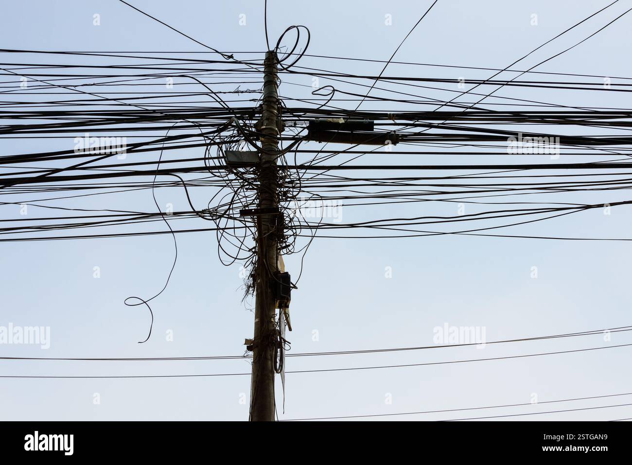 Tangled utility pole cables hi-res stock photography and images - Alamy