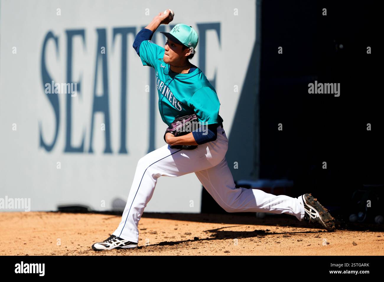 Seattle Mariners pitcher Shintaro Fujinami throws in the bullpen during ...