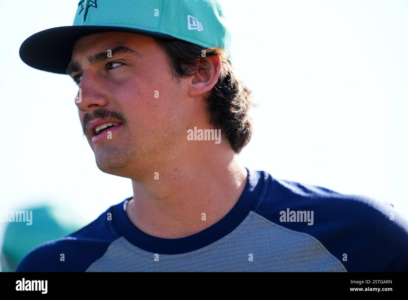 Seattle Mariners infielder Cole Young warms up during spring training ...