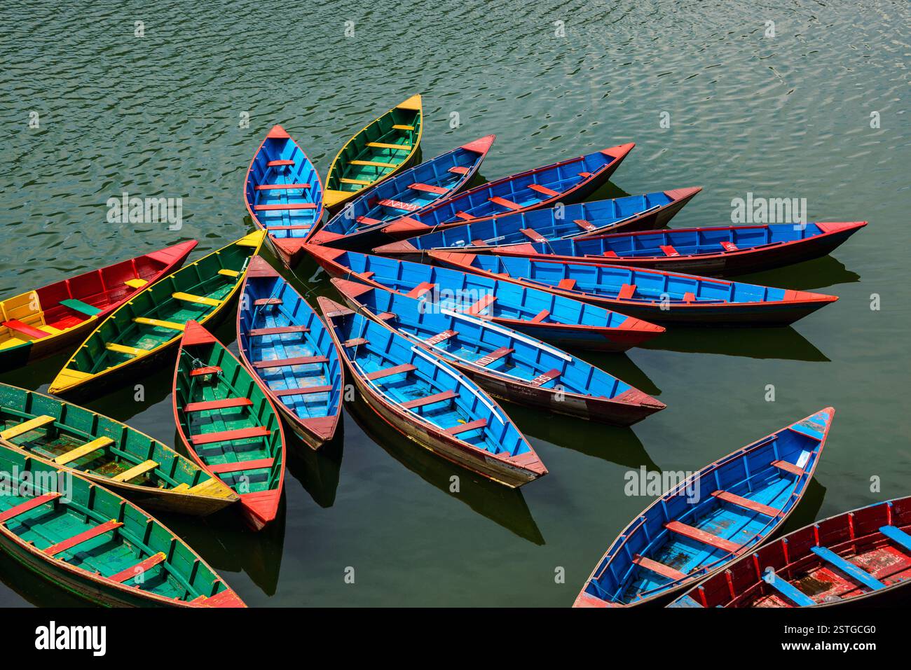 Colorful small boats on Phewa Lake in Pokhara, Nepal Stock Photo - Alamy