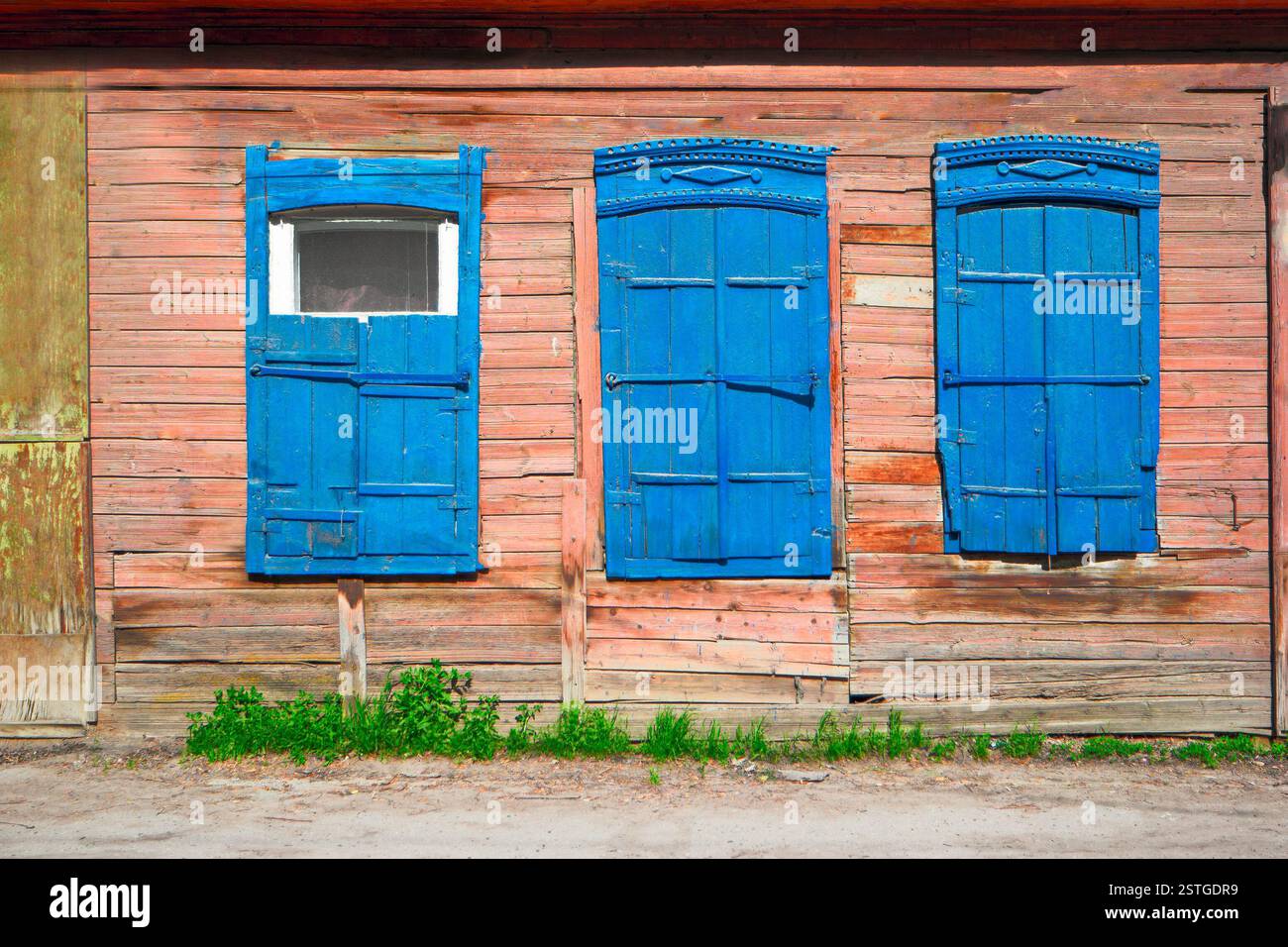 Old wooden blue window of slum house in Astrakhan, Russia Stock Photo ...