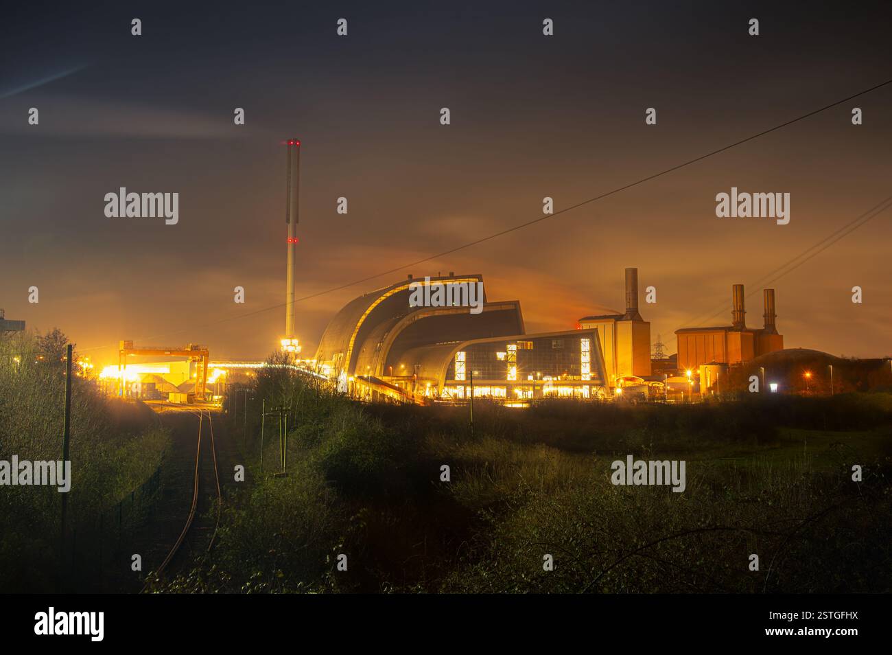 A power station on the bleak shore of the Severn estuary near Avonmouth ...