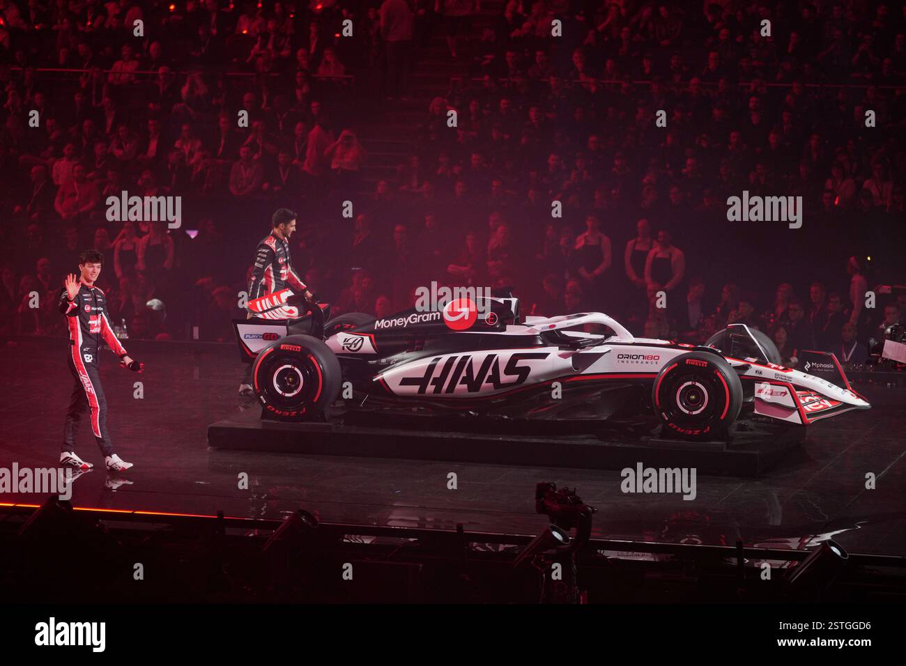 Haas driver Oliver Bearman of Britain, left, and Haas driver Esteban ...