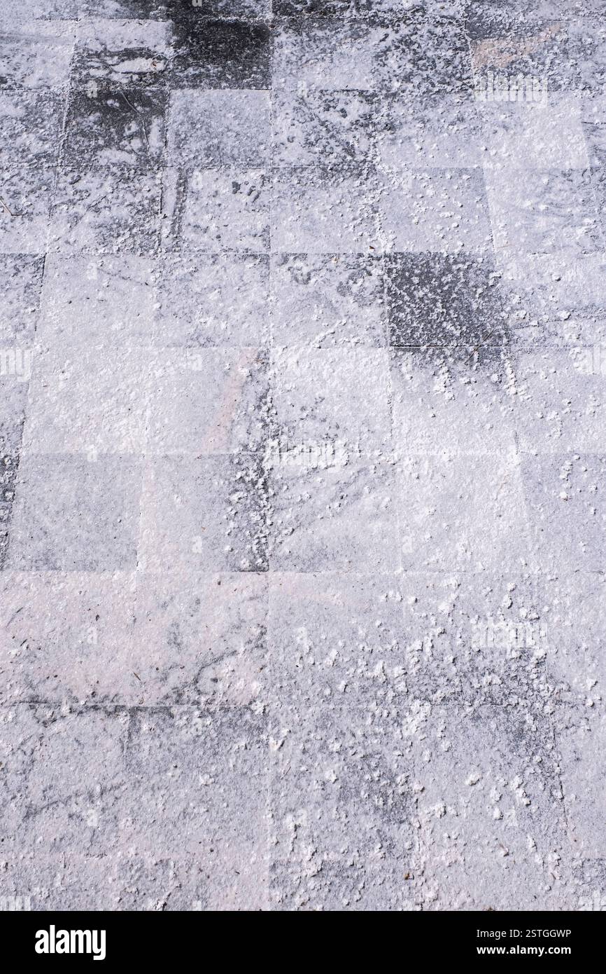 bottom of a salt evaporation pond with salt residue, texture of the ...