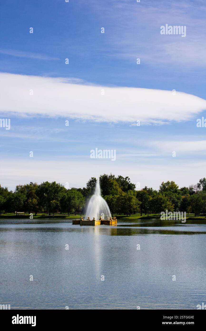 A unique architectural fountain on a pond at Denver Botanic Gardens ...