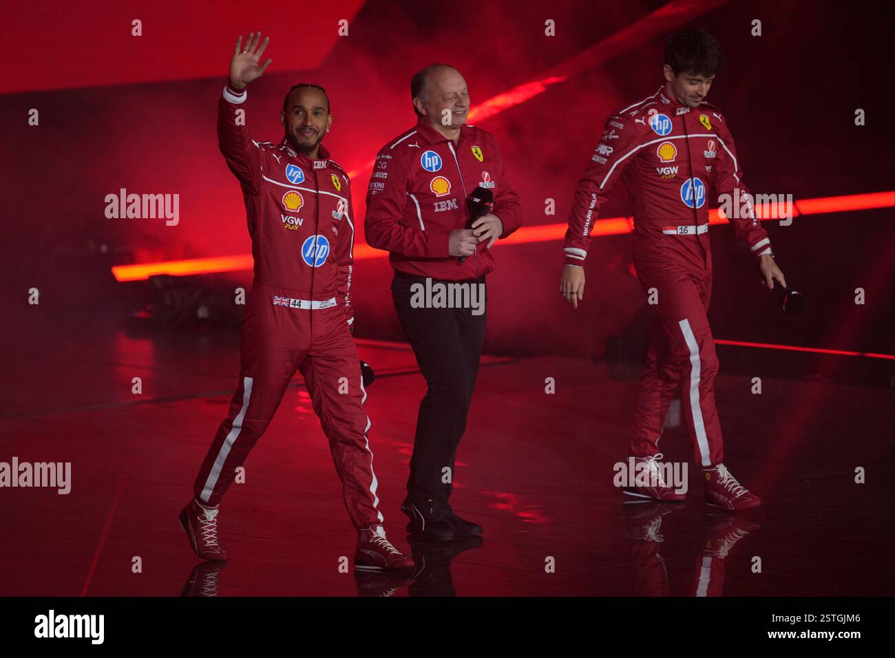 Ferrari driver Lewis Hamilton of Britain, left, Ferrari team principal ...