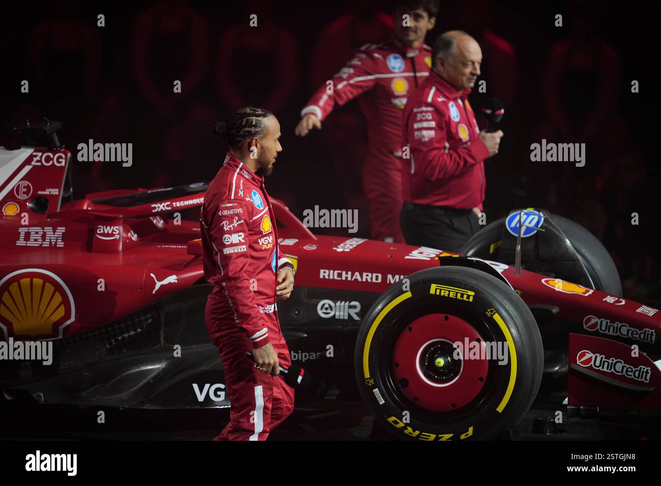 Ferrari driver Lewis Hamilton of Britain, left, Ferrari team principal ...