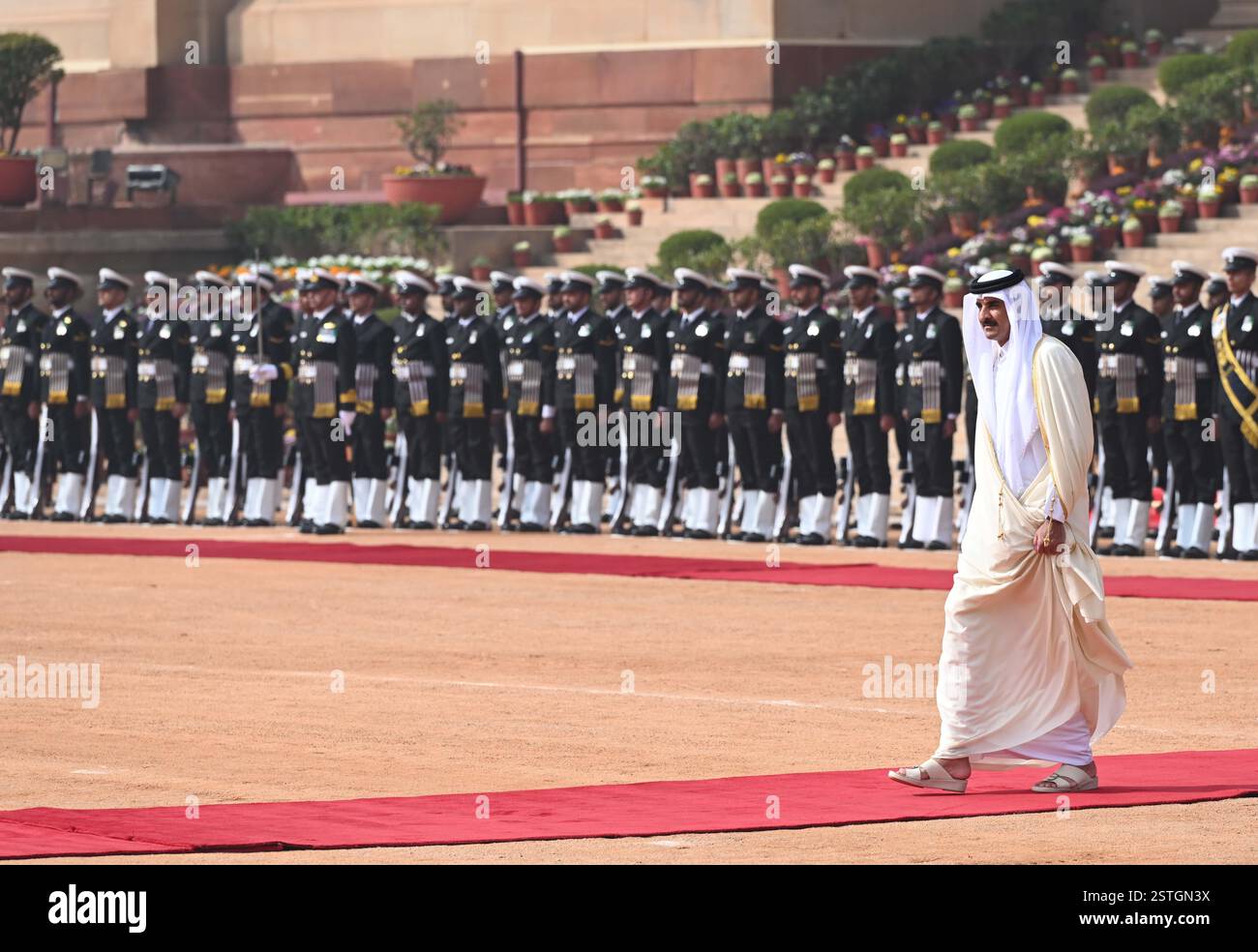 NEW DELHI, INDIA - FEBRUARY 18: Emir of Qatar, Sheikh Tamim Bin Hamad Al-Thani inspects the ...