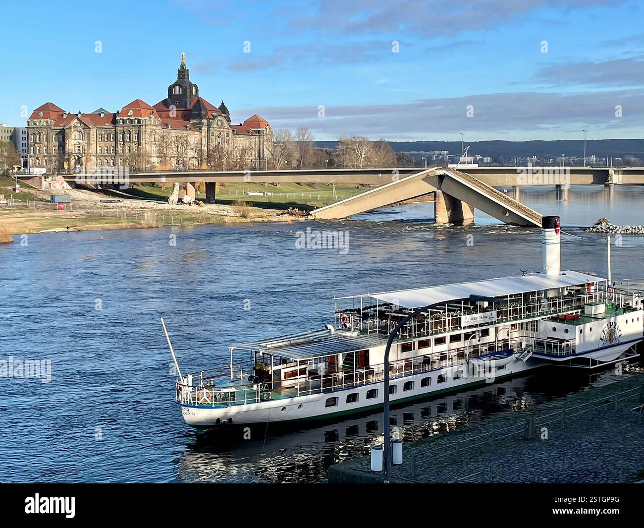 Collapsed Carola Bridge over the Elbe in Dresden with the building of ...