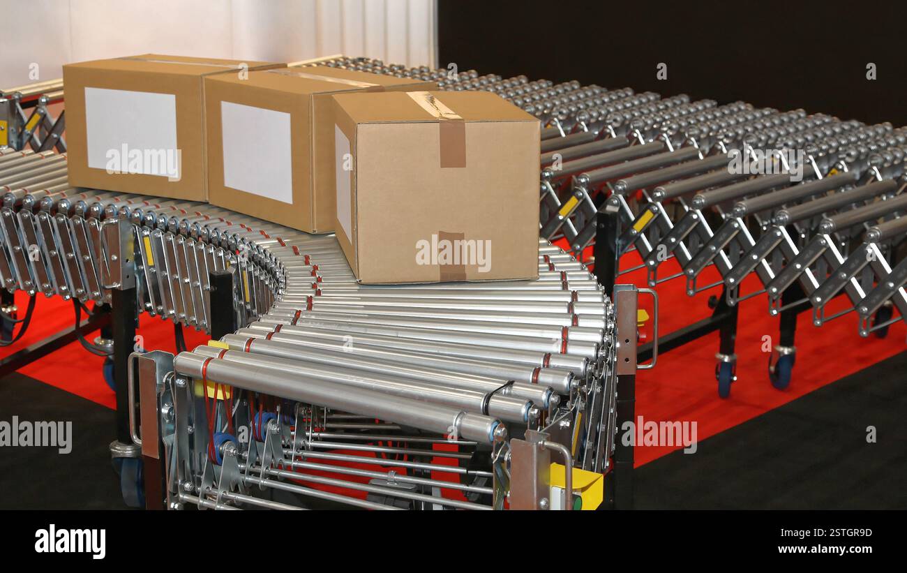Powered conveyor rollers for transfer box in factory hi-res stock ...